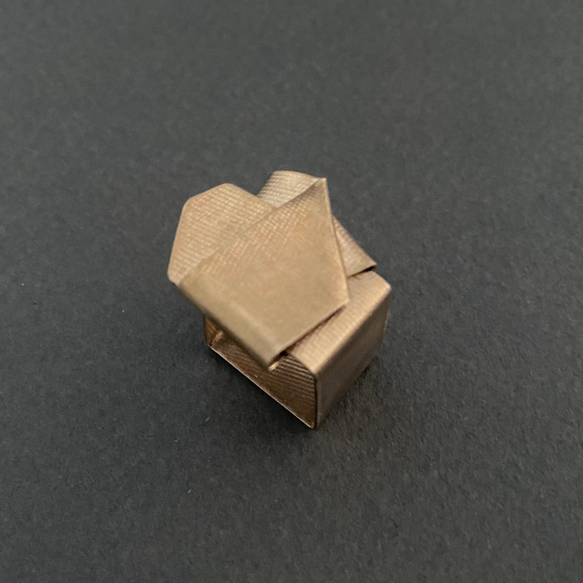 ST595 - folded & knotted bronze sheet ring; square – S. Tector Metals